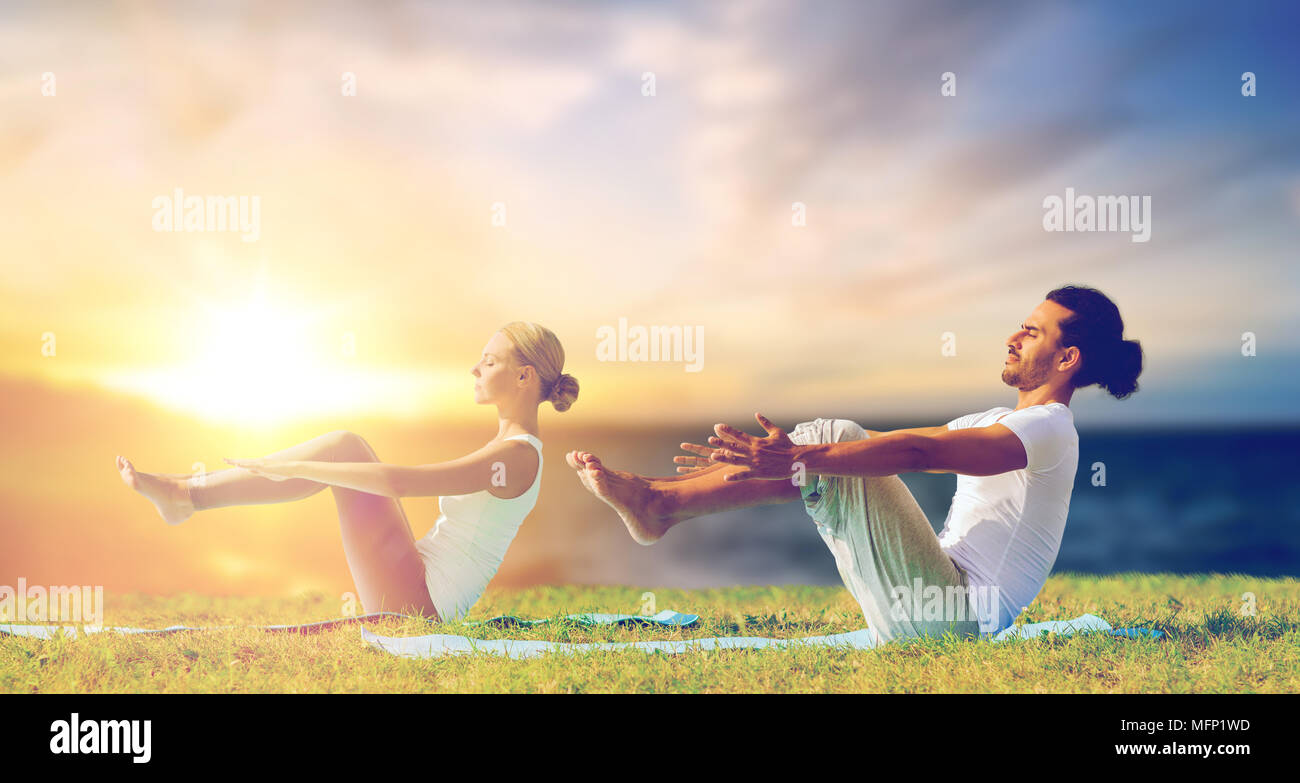 Boat pose couple yoga hi-res stock photography and images - Alamy