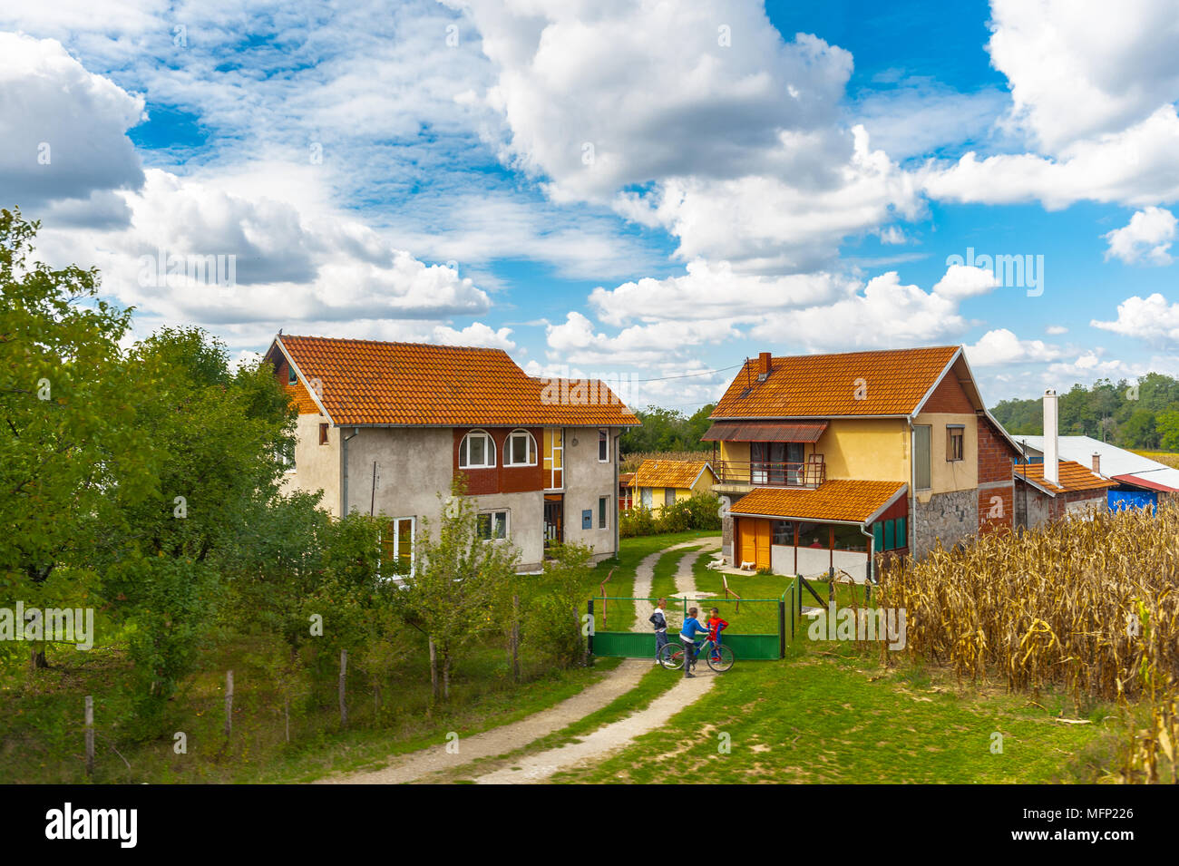 Farm houses a Serbian village Stock Photo - Alamy