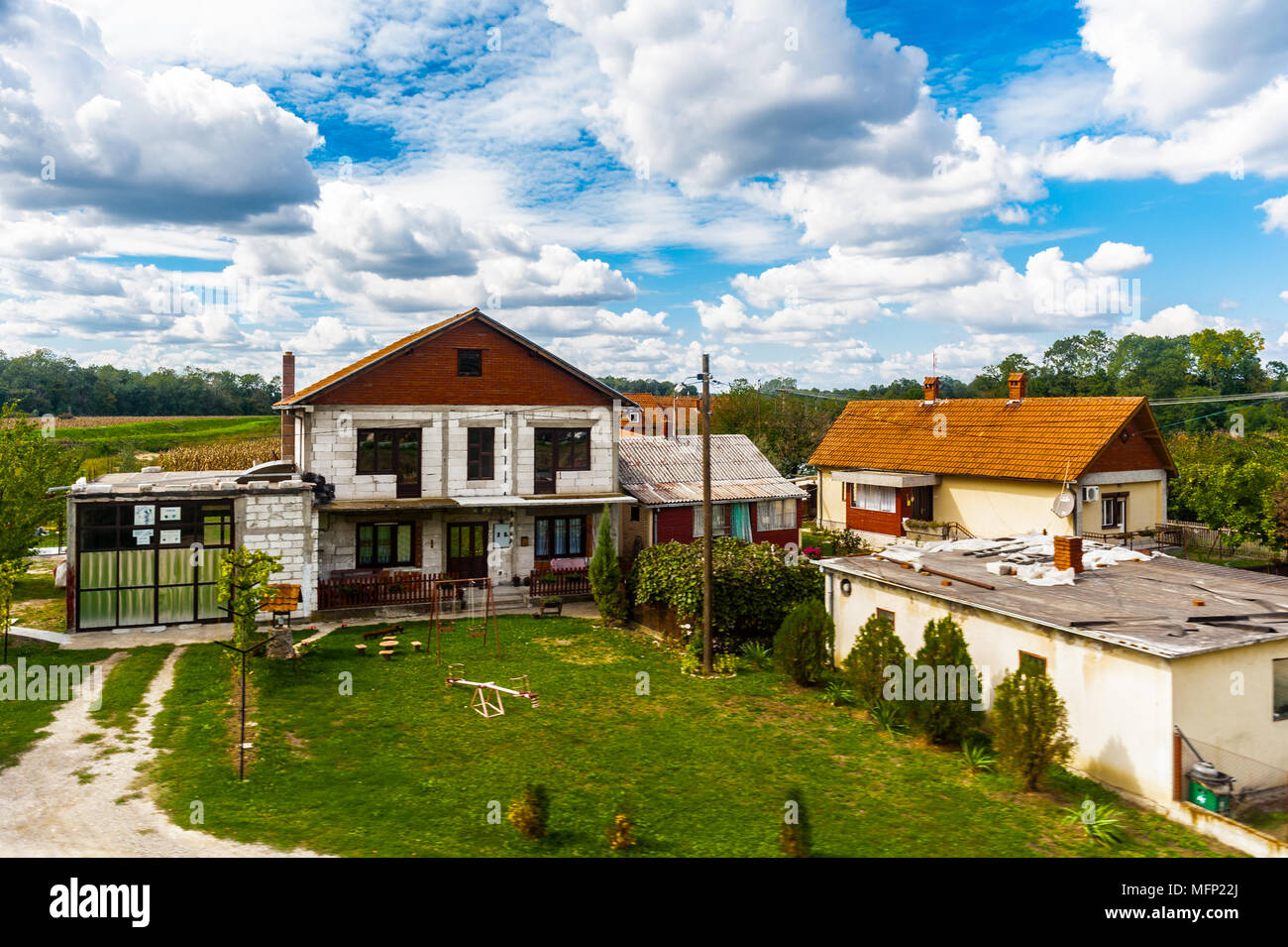 Farm houses a Serbian village Stock Photo - Alamy