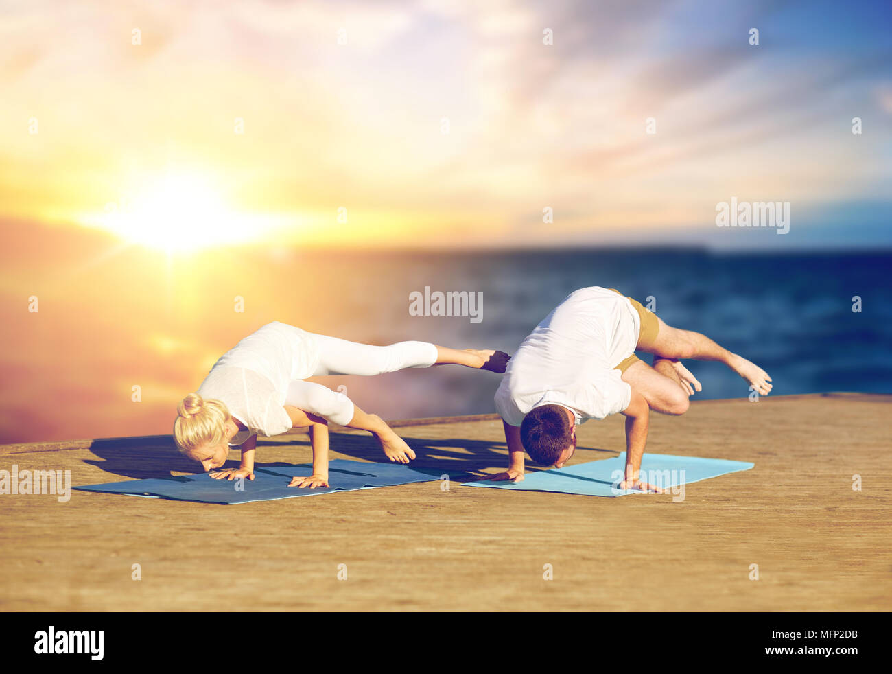 Doing crane pose hi-res stock photography and images - Alamy