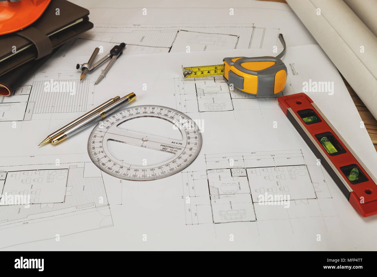 Blue print and measurement tool on architect's desk, architectural ...