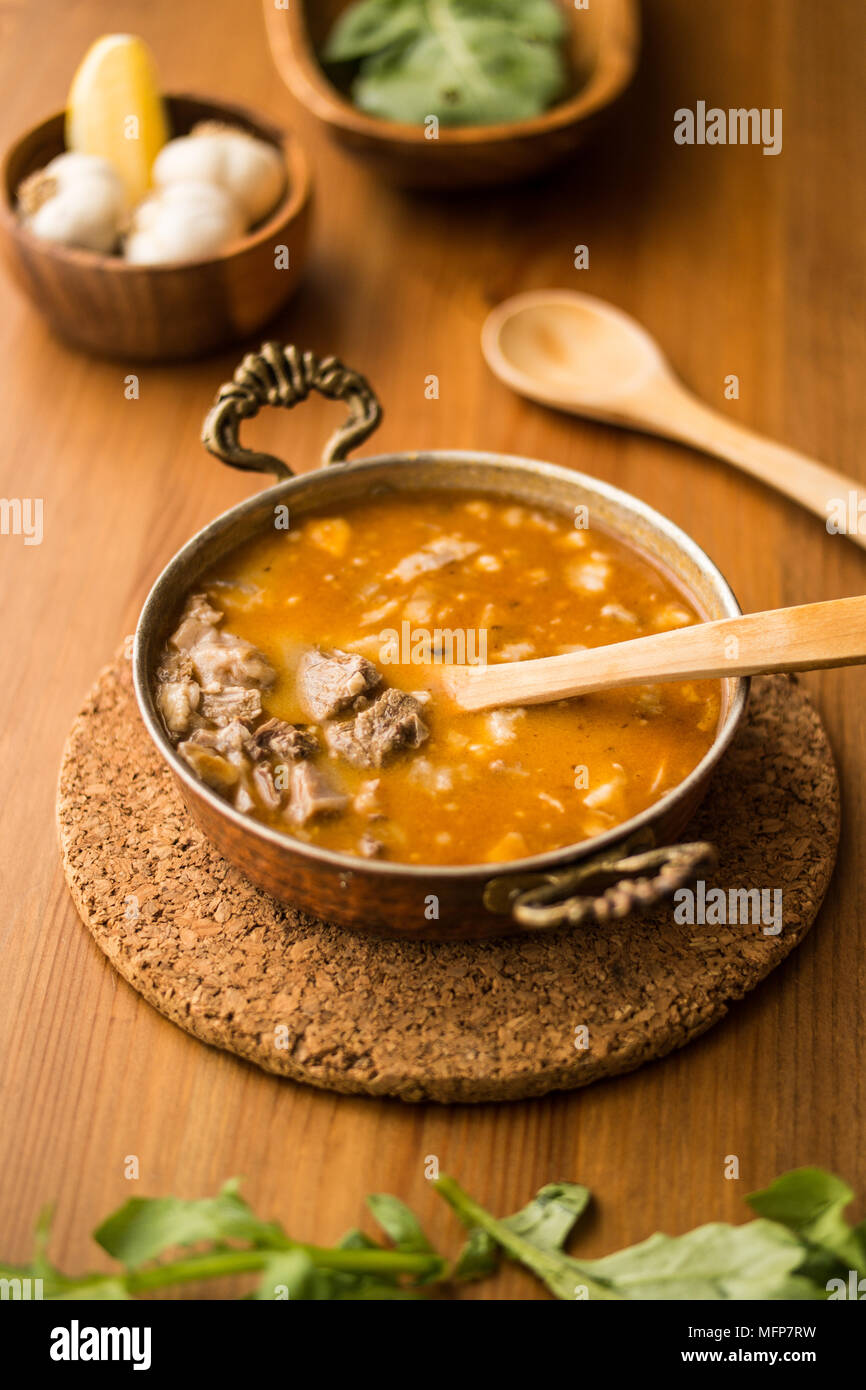 Traditional Turkish Meat Soup Kelle Paca in a copper bowl Stock Photo ...