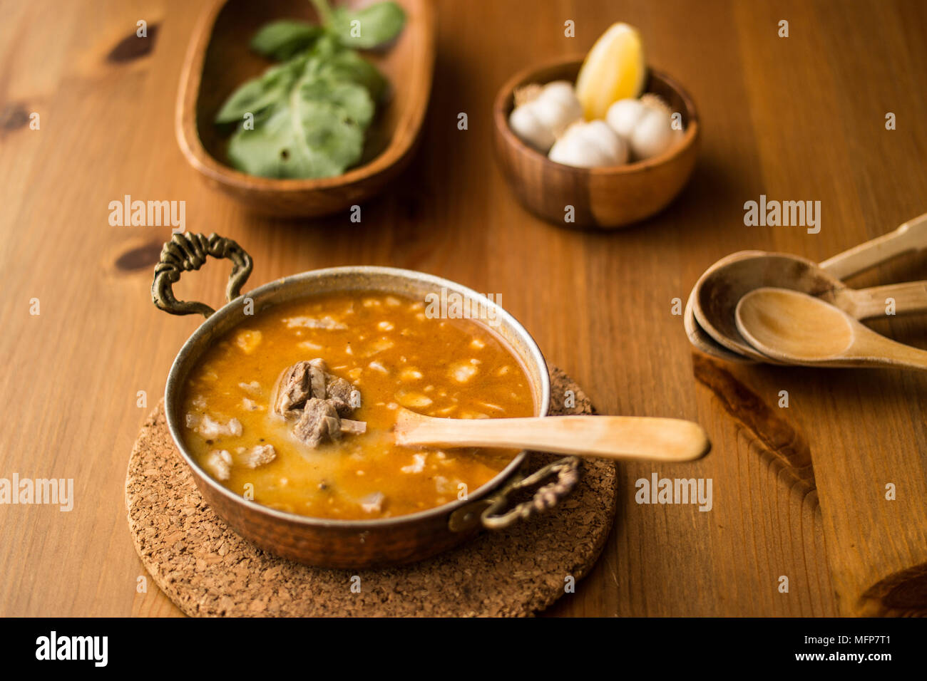 Traditional Turkish Meat Soup Kelle Paca in a copper bowl Stock Photo ...