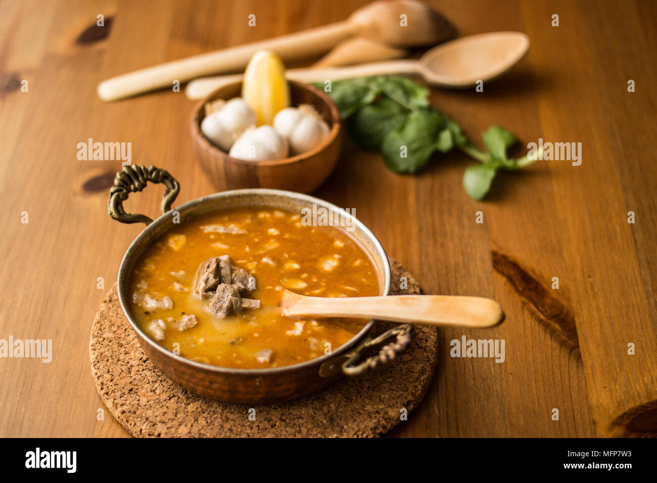 Traditional Turkish Meat Soup Kelle Paca in a copper bowl Stock Photo ...