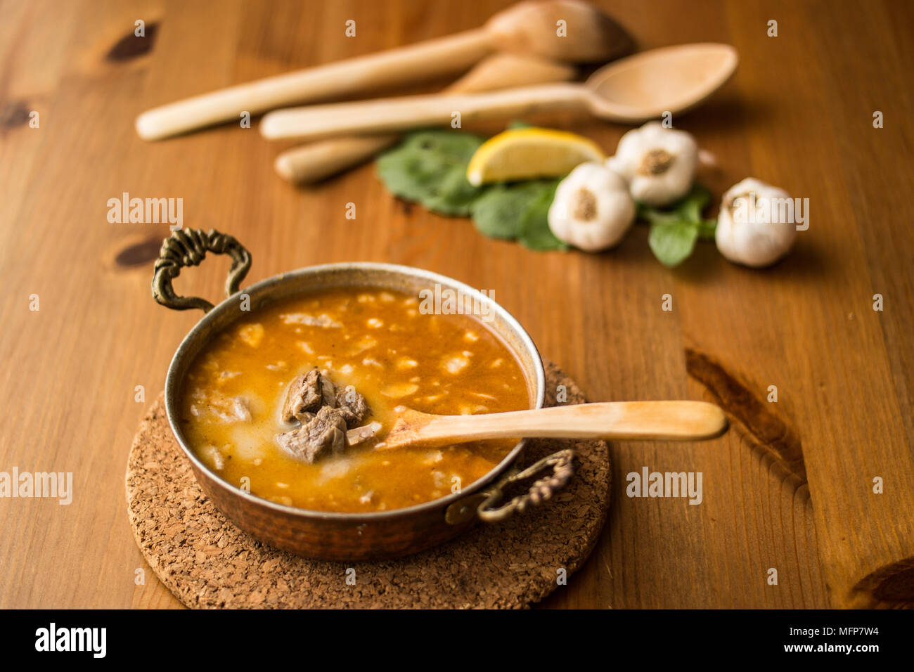 Traditional Turkish Meat Soup Kelle Paca in a copper bowl Stock Photo ...