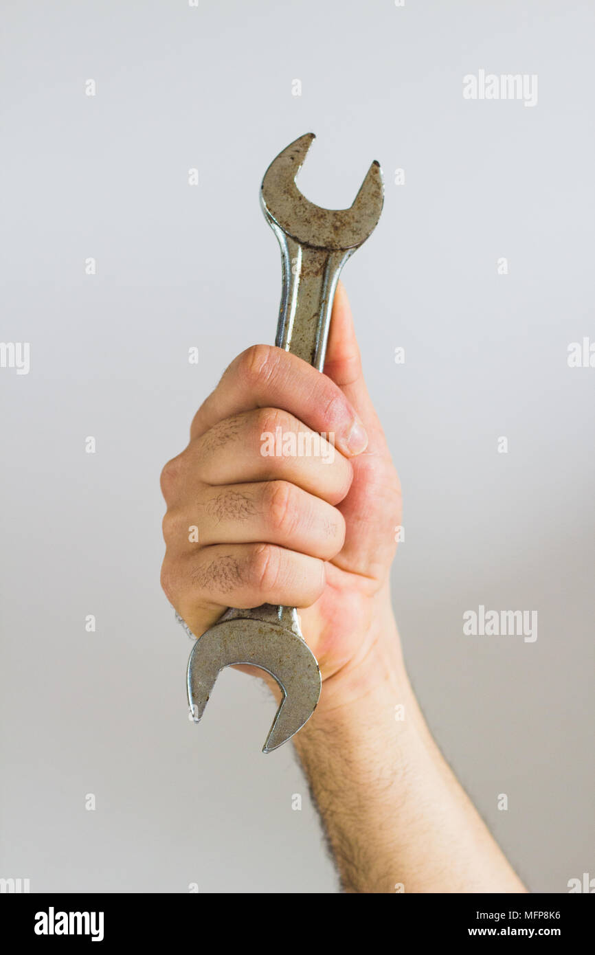 hand holding a Wrench Stock Photo - Alamy