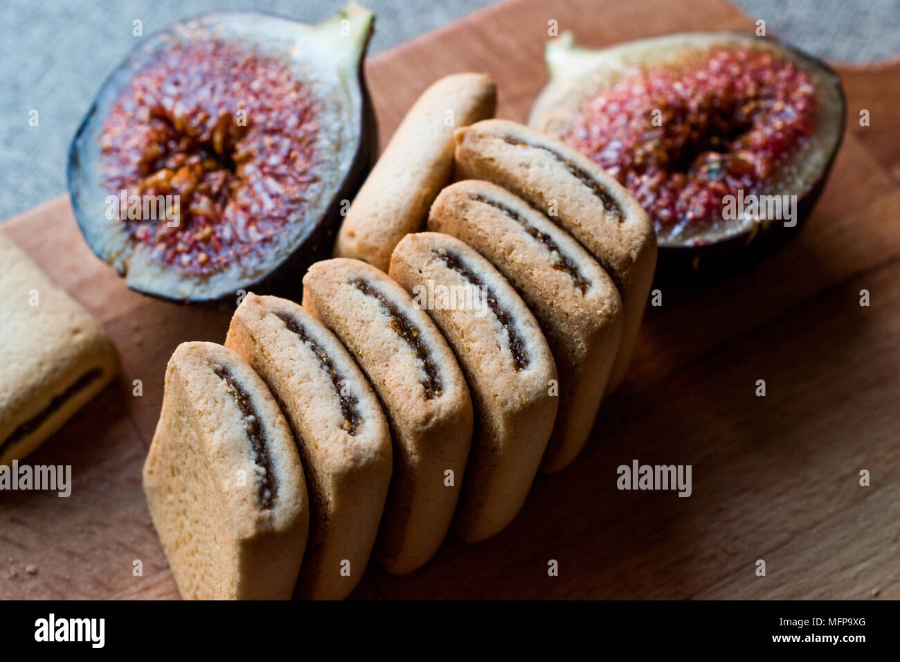 Fig Cookies with fruits on wooden surface. Organic Food Stock Photo - Alamy