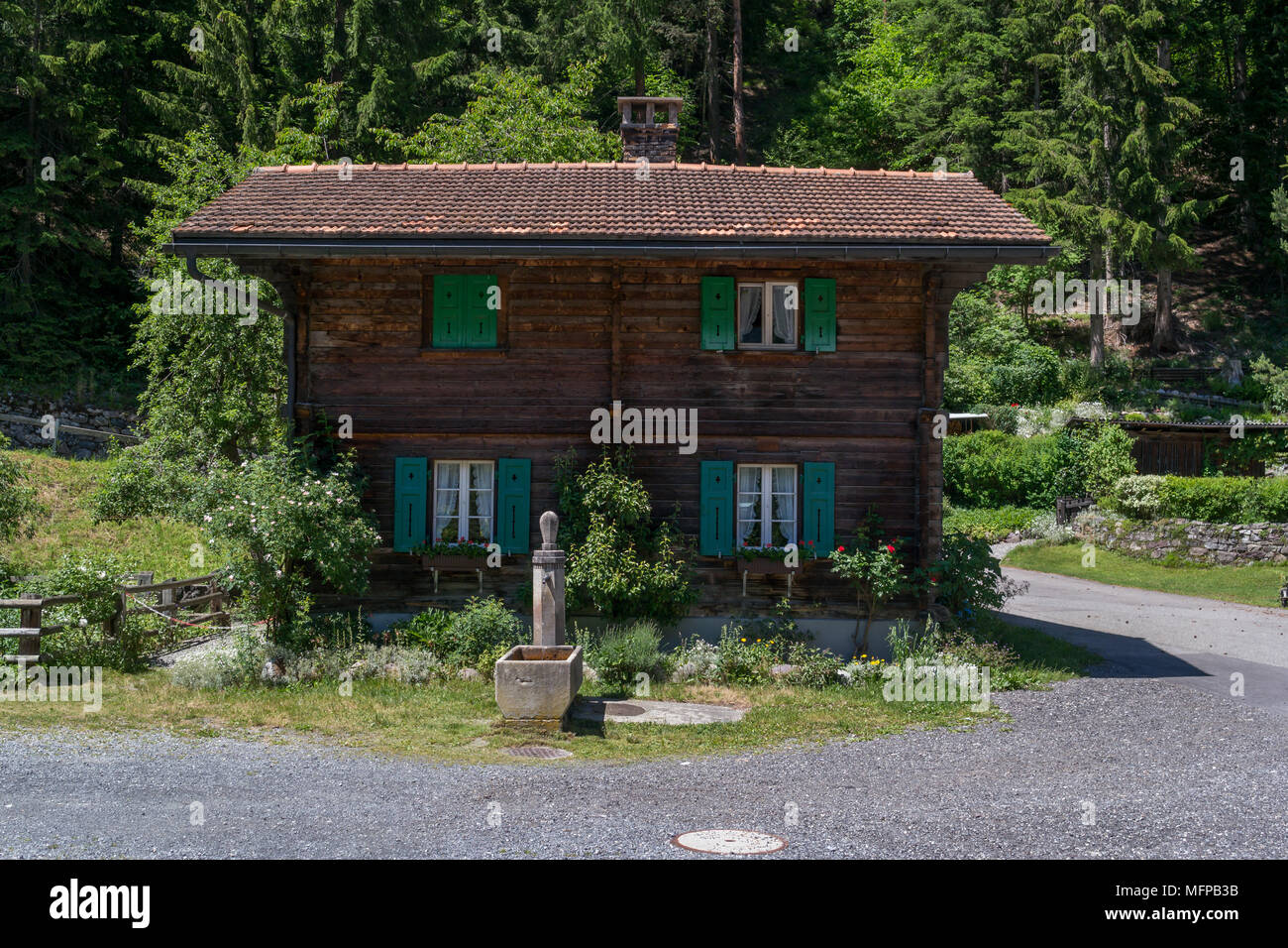Swiss Log House next to Wiesen Davos Station Stock Photo - Alamy