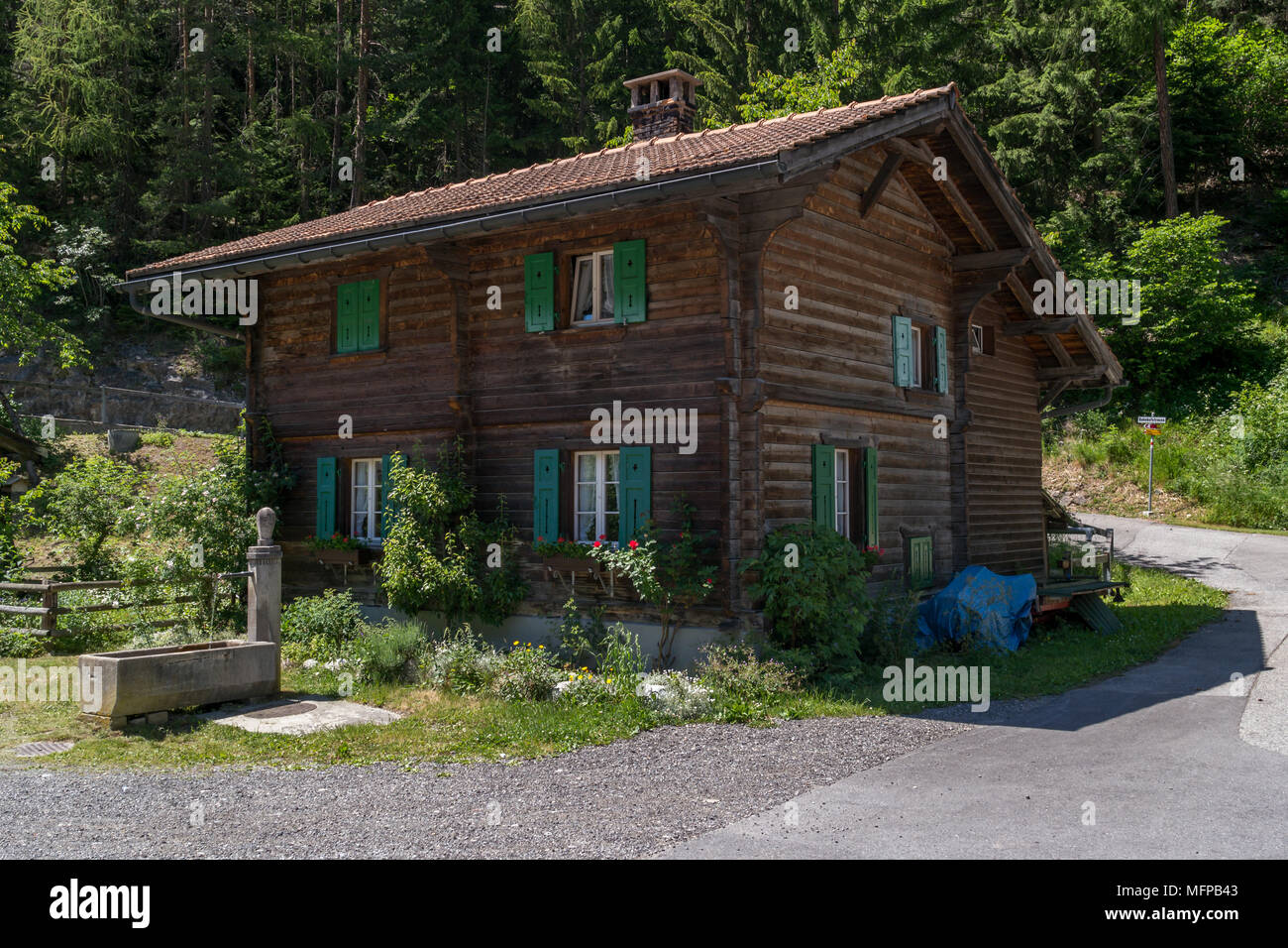 Swiss Log House next to Wiesen Davos Station Stock Photo - Alamy