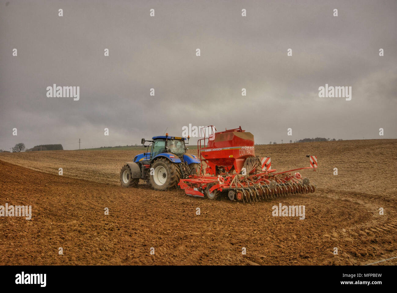 Farmer on tractor sowing seeds hi-res stock photography and images - Alamy