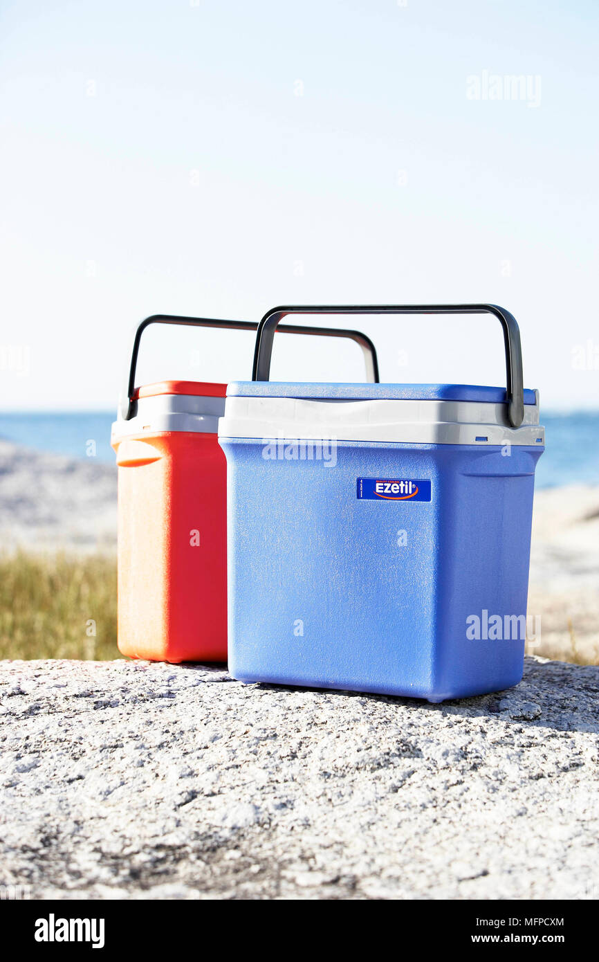 Two cool boxes on beach Stock Photo - Alamy