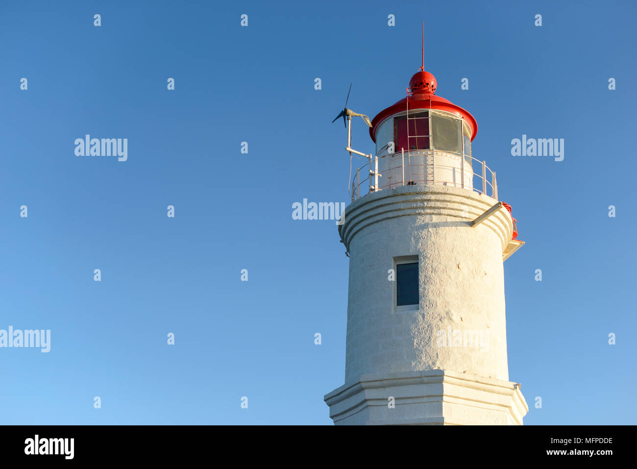White lighthouse up close blue sky hi-res stock photography and images ...