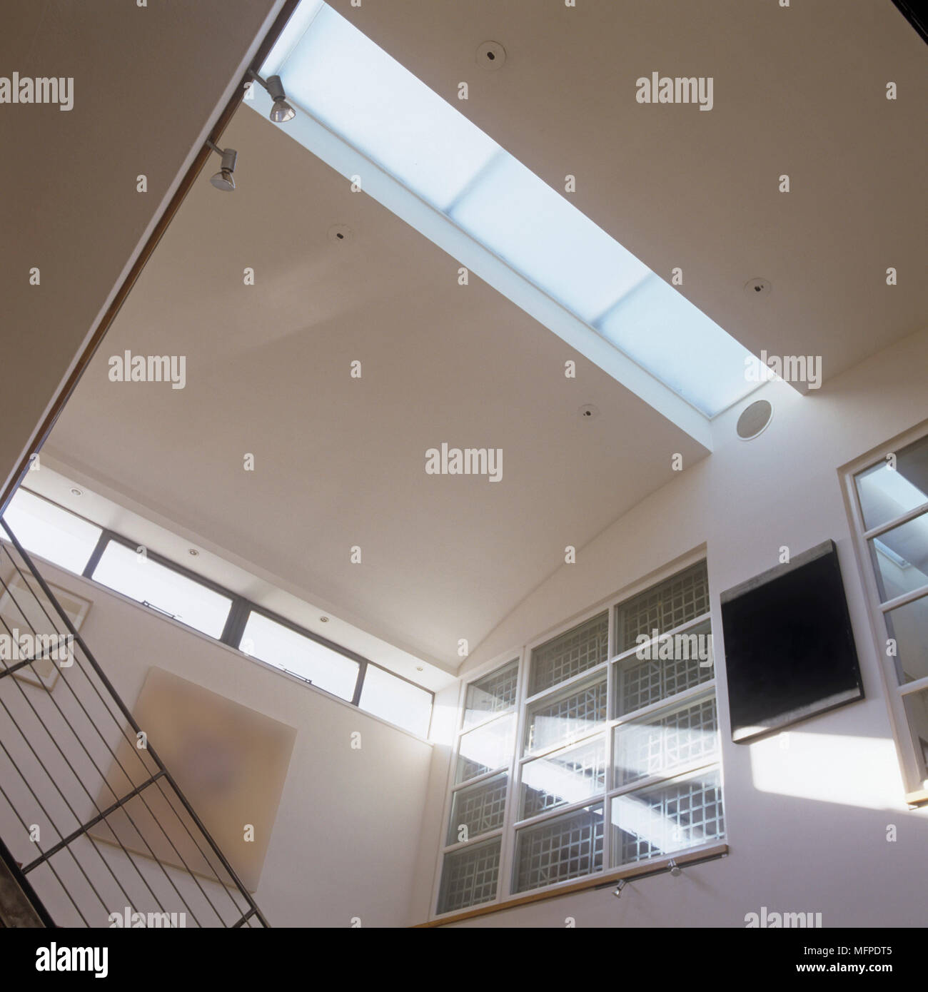 View from below of ceiling with skylights and windows Stock Photo - Alamy