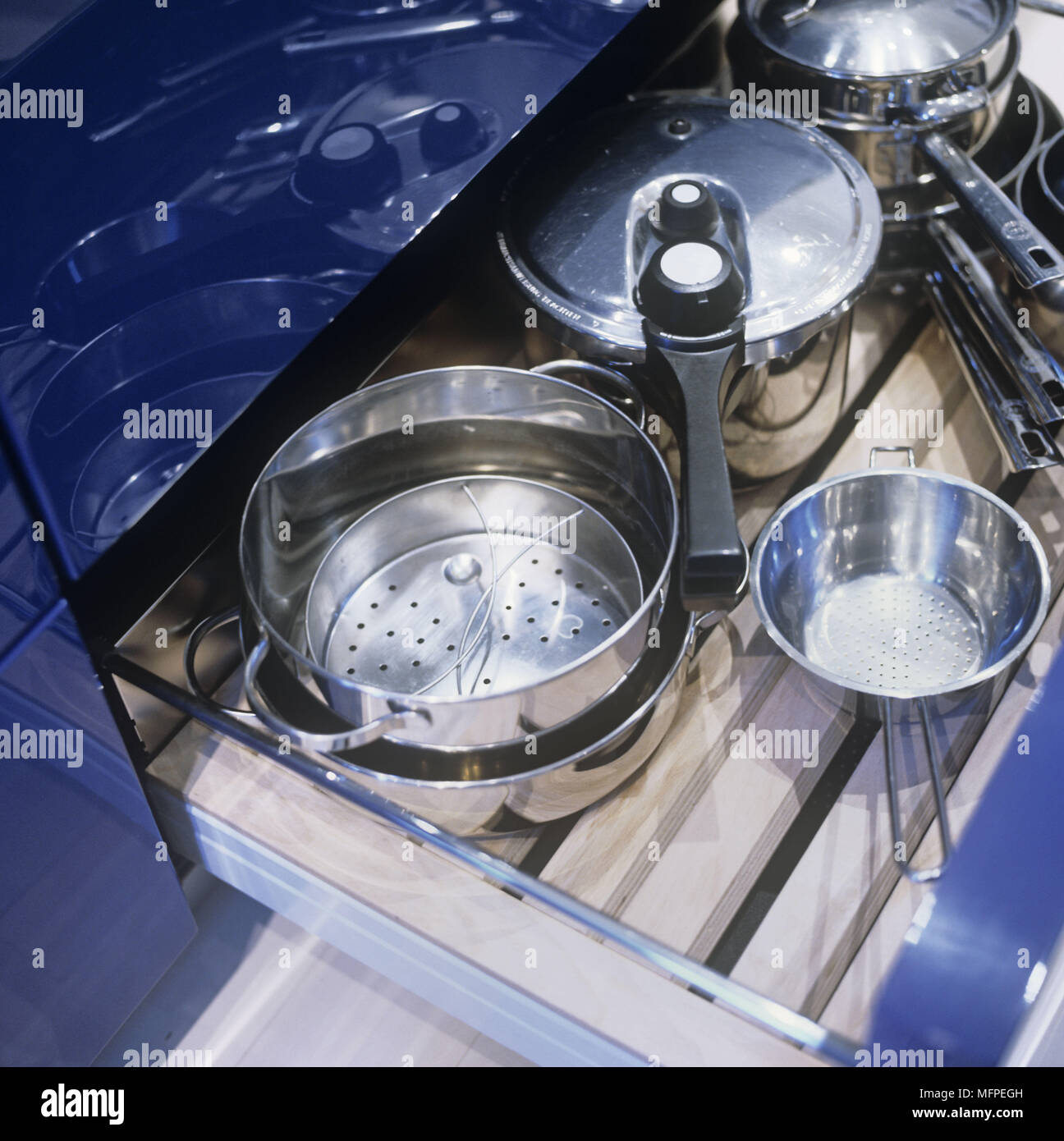 modern kitchen detail tray full of kitchen utensils Stock Photo - Alamy