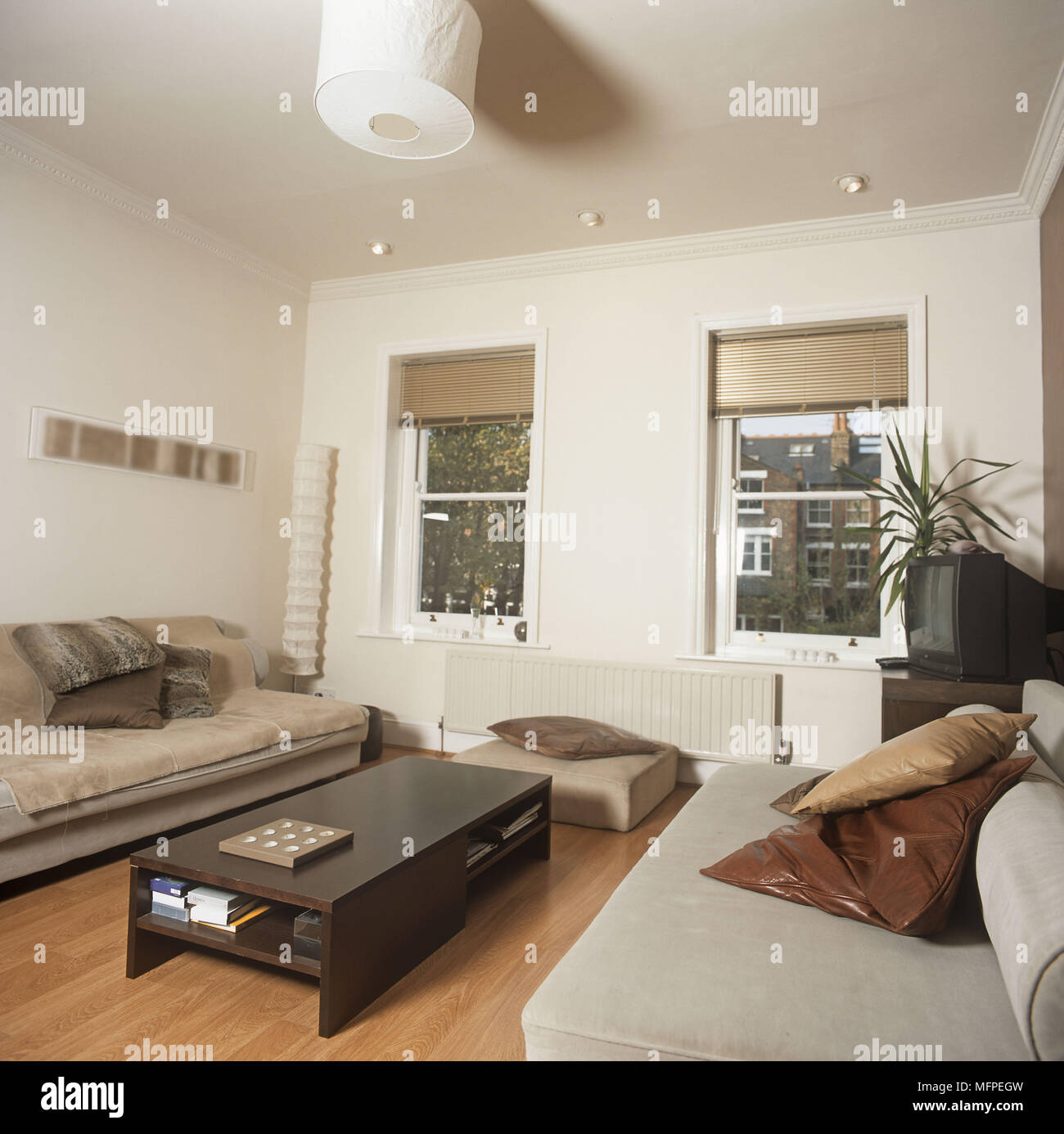 Modern sitting room upholstered sofa coffee table Stock Photo - Alamy