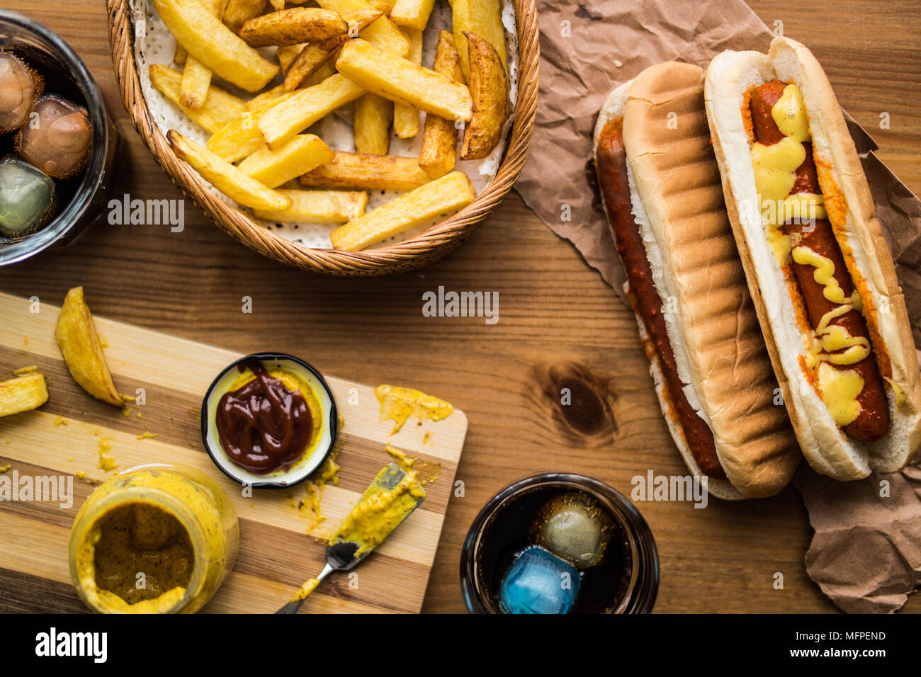 A hot dog (also spelled hotdog) is a cooked sausage, traditionally ...