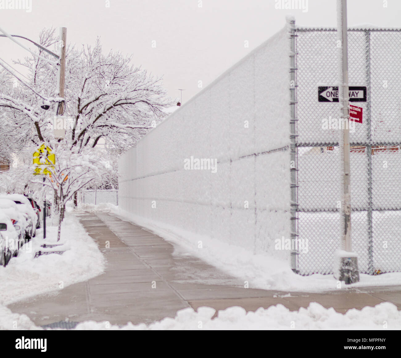 Snow Covered Fence with A Freshly Shovelled Pathway Stock Photo - Alamy