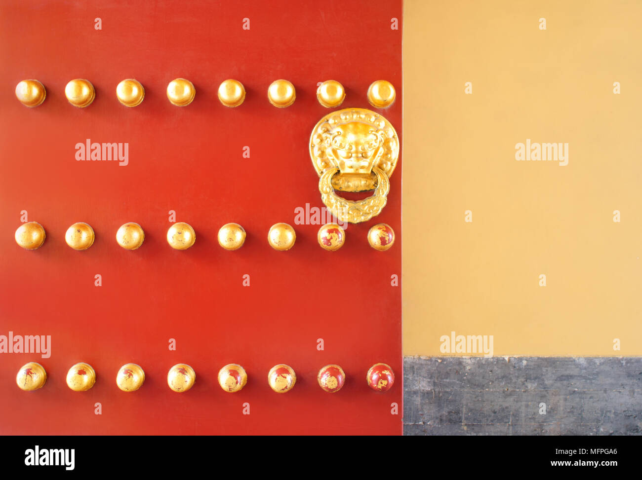 Traditional red chinese gate with gold lion and free space Stock Photo ...