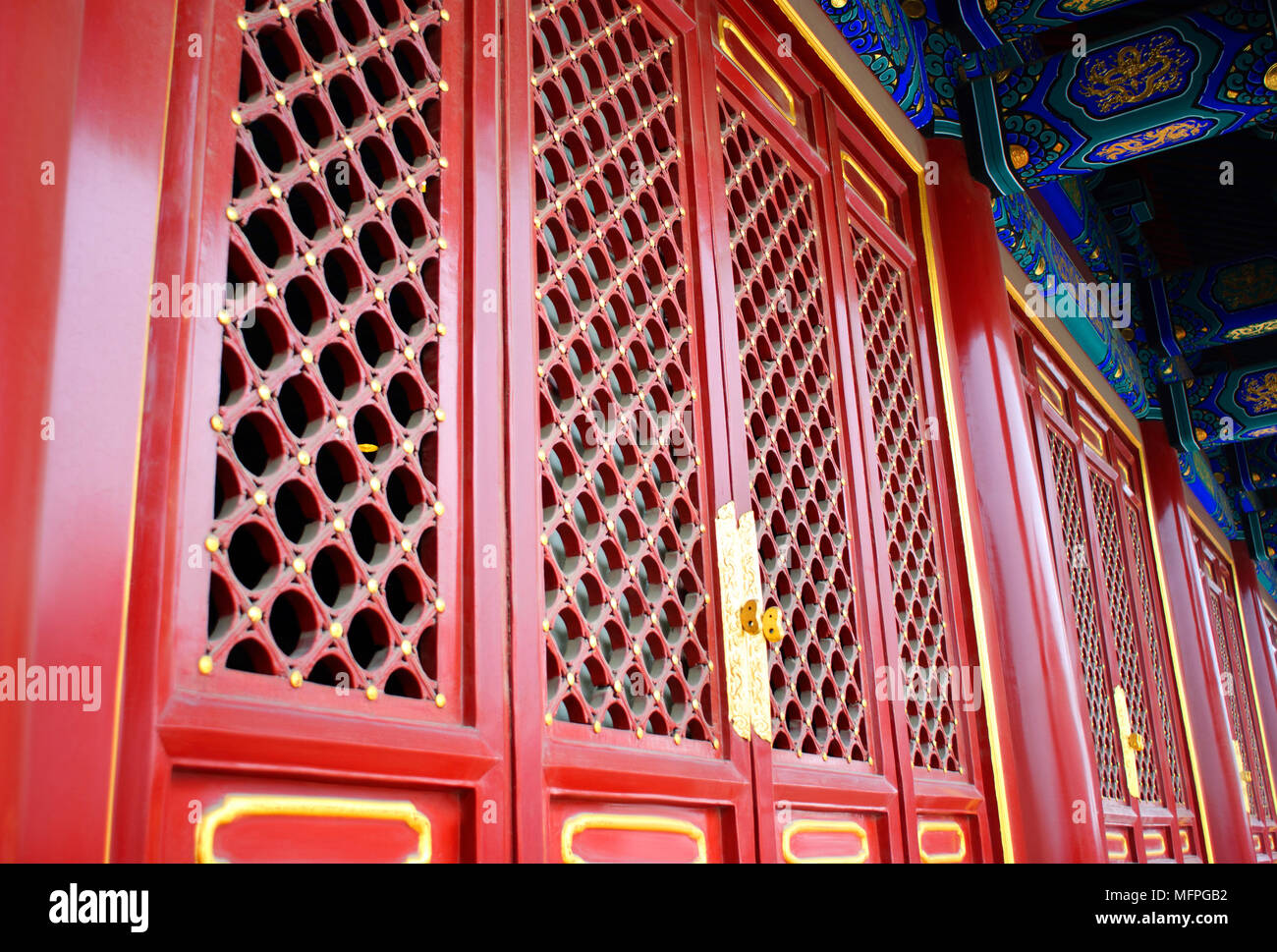 Beautiful old traditional red chinese doors background Stock Photo - Alamy
