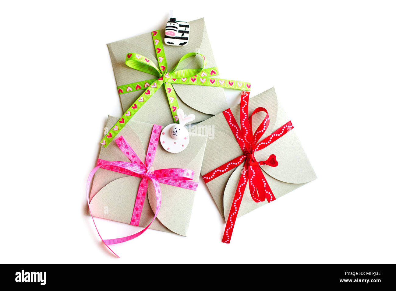 The group of three beautiful gifts isolated Stock Photo - Alamy
