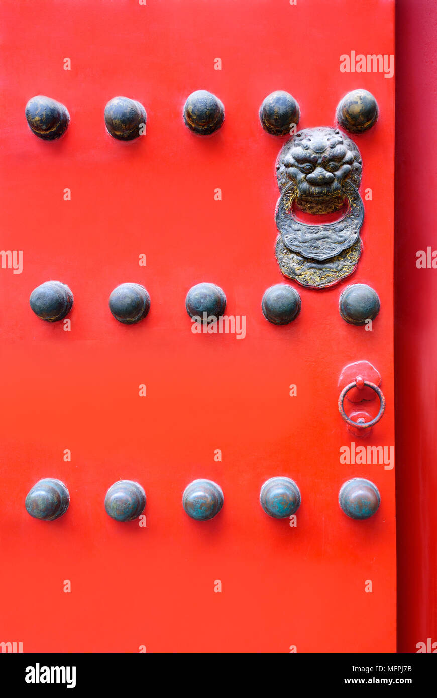 Traditional red chinese gate with gold lion vertical photo Stock Photo ...