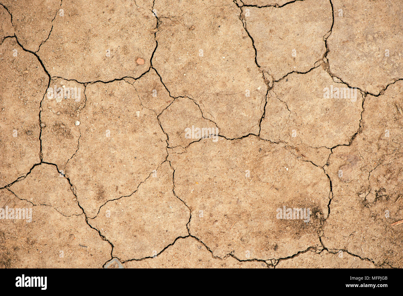 Top view of cracked dry soil ground texture for drought season ...