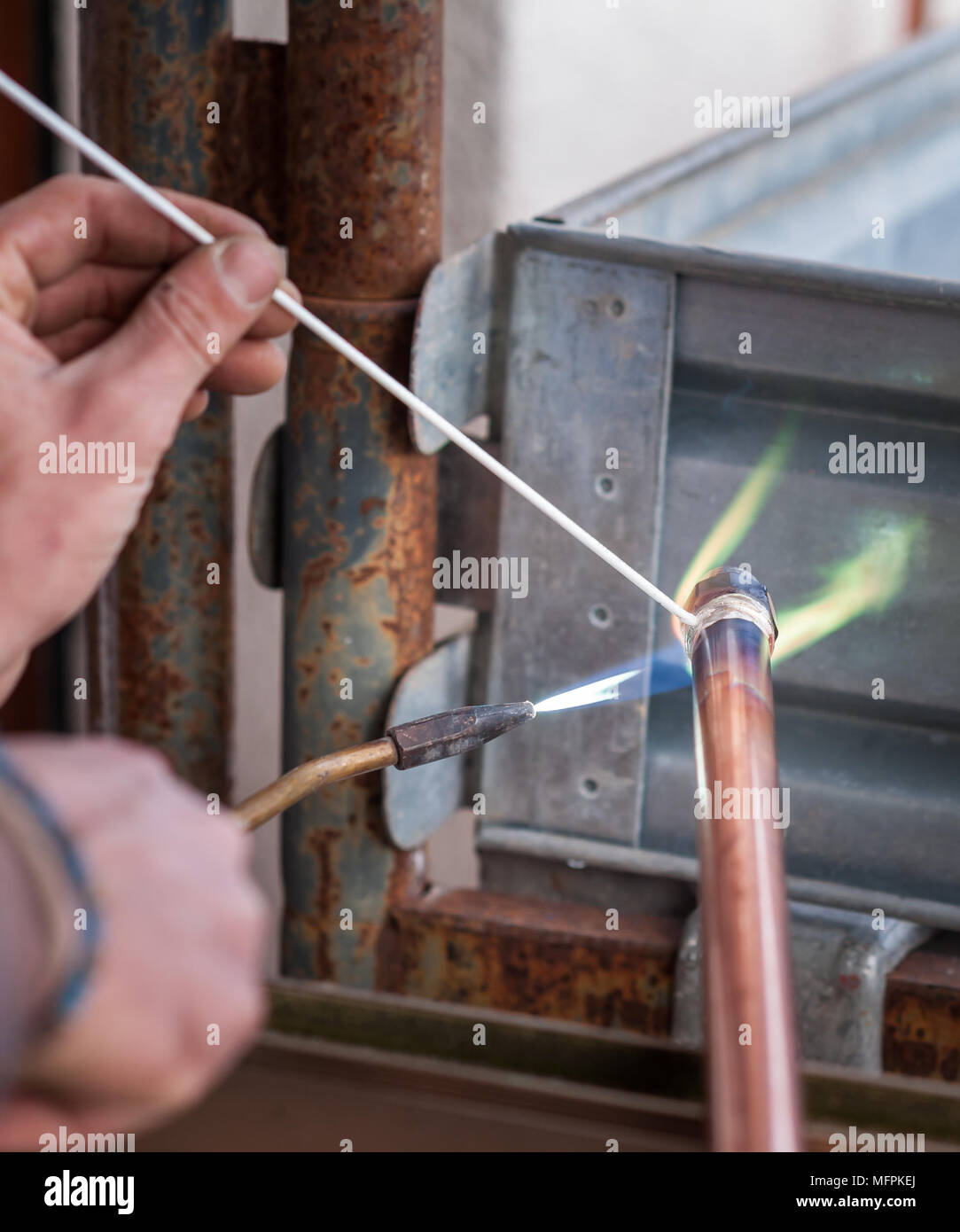 Welding of copper pipe of a methane gas pipeline or of a conditioning ...