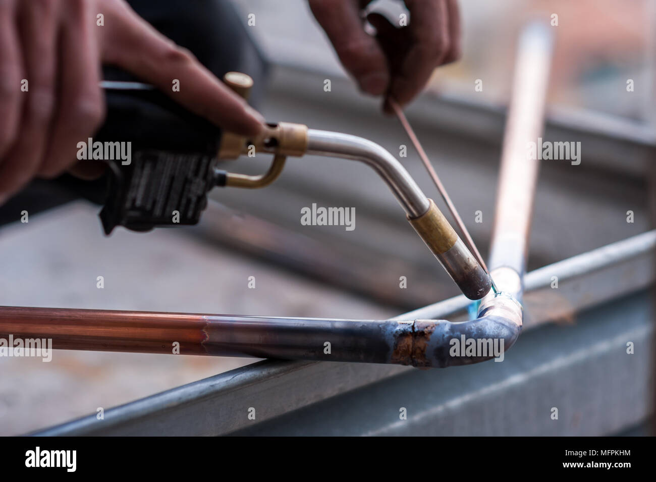Welding of copper pipe of a methane gas pipeline or of a conditioning ...