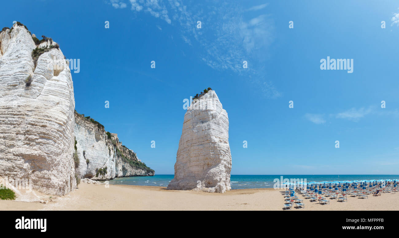Summer picturesque Beach of Pizzomunno with famous white rock, in ...