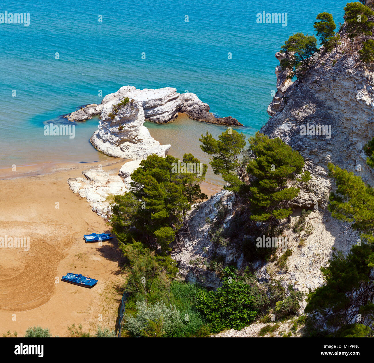 Summer Lido di Portonuovo Adriatic sea beach view with two old ...