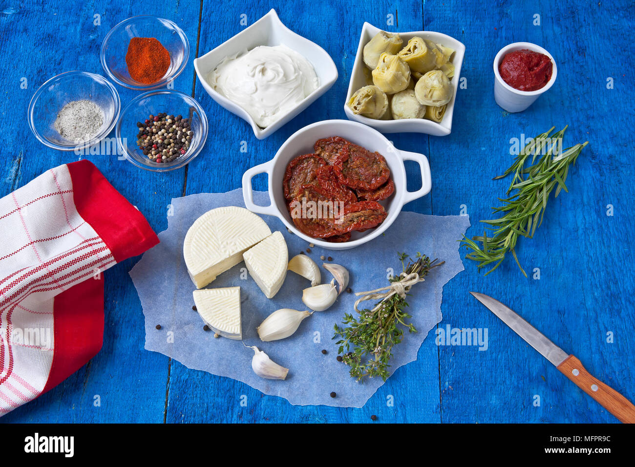 Feta cheese, string cheese, dried tomatoes, artichoke hearts, herbs and ...