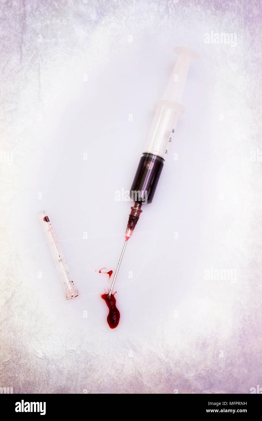 Syringe filled with blood hi-res stock photography and images - Alamy