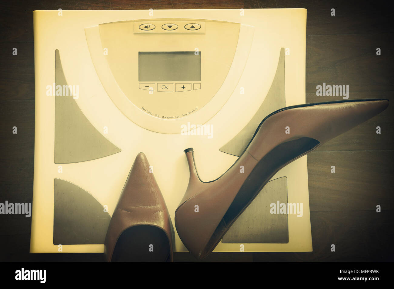 Scale weight shoes hi-res stock photography and images - Alamy