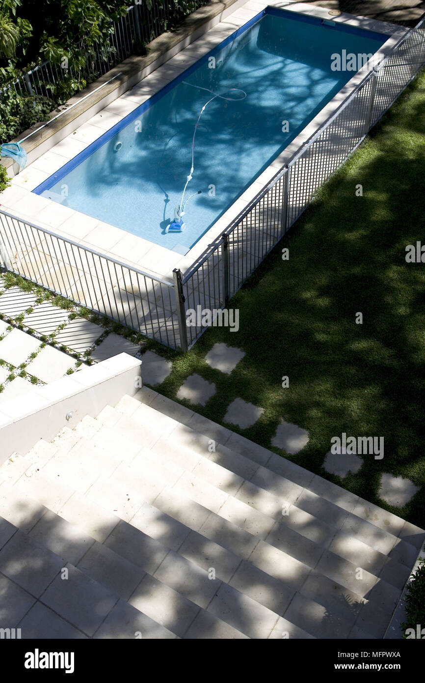 Elevated view of swimming pool in garden Stock Photo - Alamy