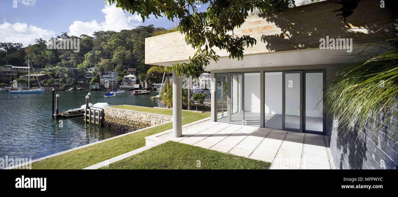 Exterior of modern house overlooking harbour Stock Photo - Alamy