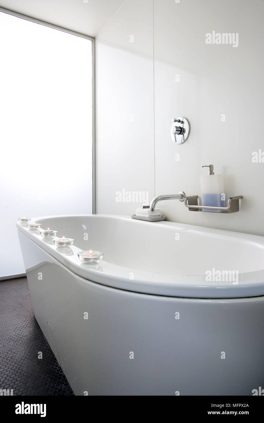 Freestanding bathtub in modern bathroom Stock Photo - Alamy