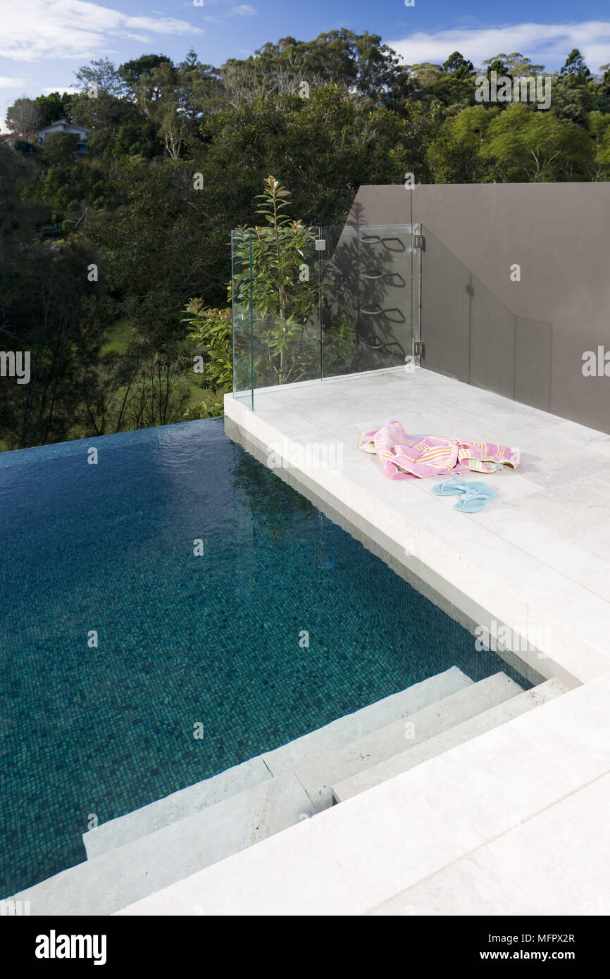 Infinity swimming pool overlooking countryside Stock Photo - Alamy