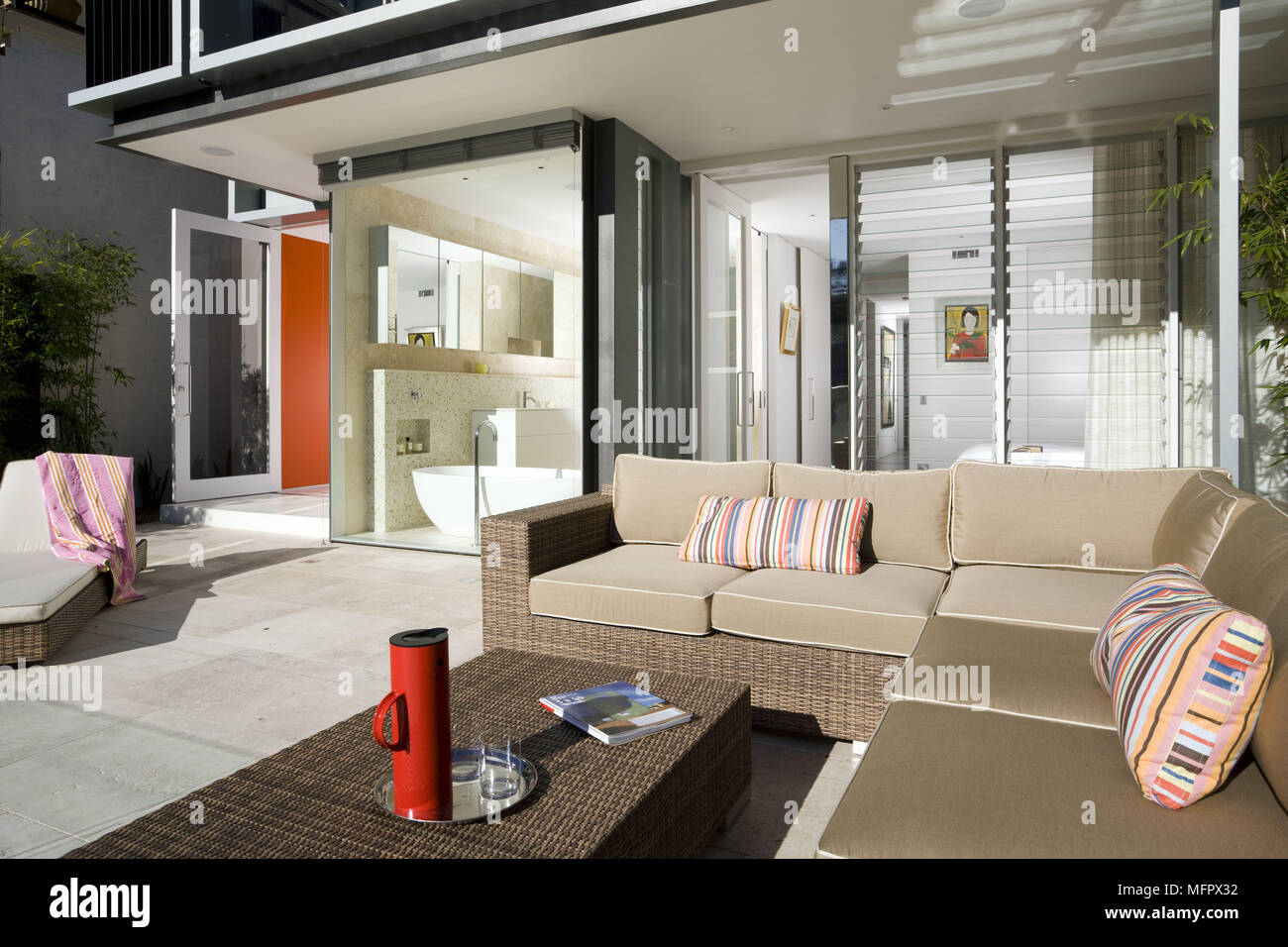 L shaped seating on terrace of modern house Stock Photo - Alamy