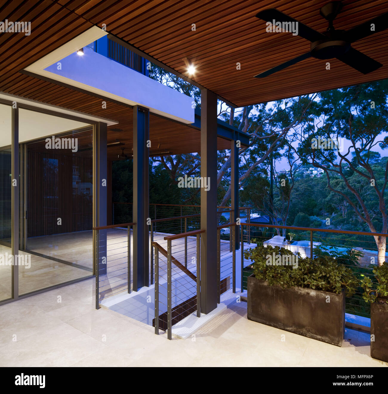 Open plan terrace with planters Stock Photo - Alamy