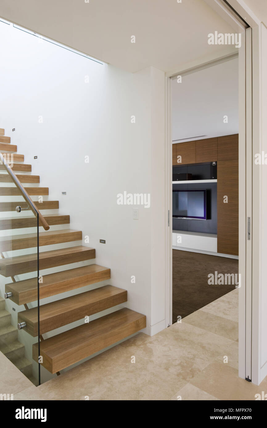 Open tread staircase in modern hallway Stock Photo - Alamy