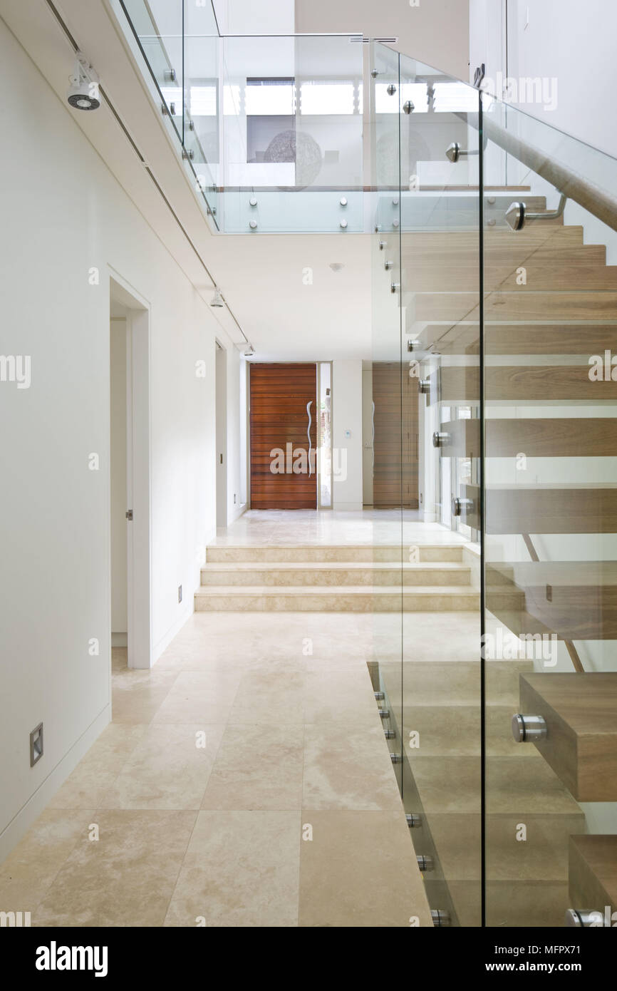 Open tread staircase in modern hallway Stock Photo - Alamy