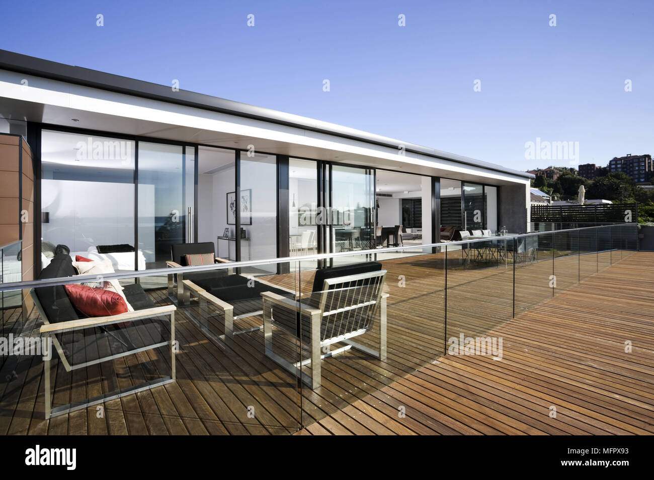 Seating on decked terrace of modern house Stock Photo - Alamy