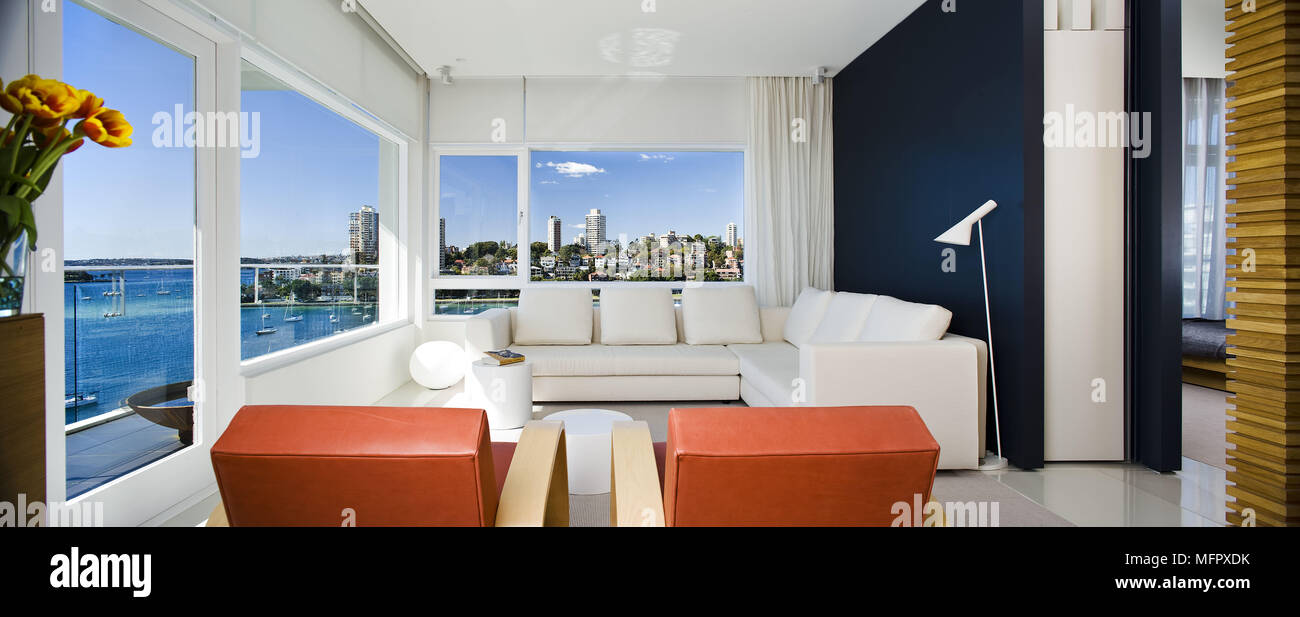 Upholstered seating in modern open plan sitting room Stock Photo - Alamy