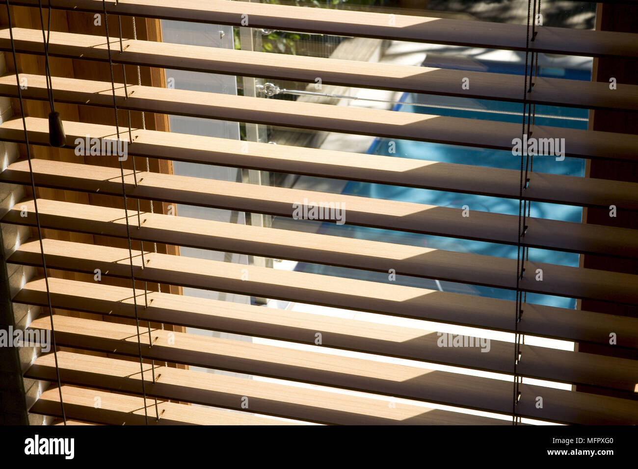 View through wooden window shutters Stock Photo - Alamy