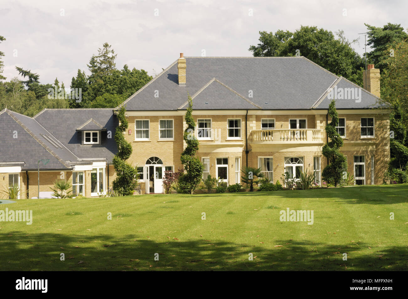 Exterior of new build country house Stock Photo - Alamy