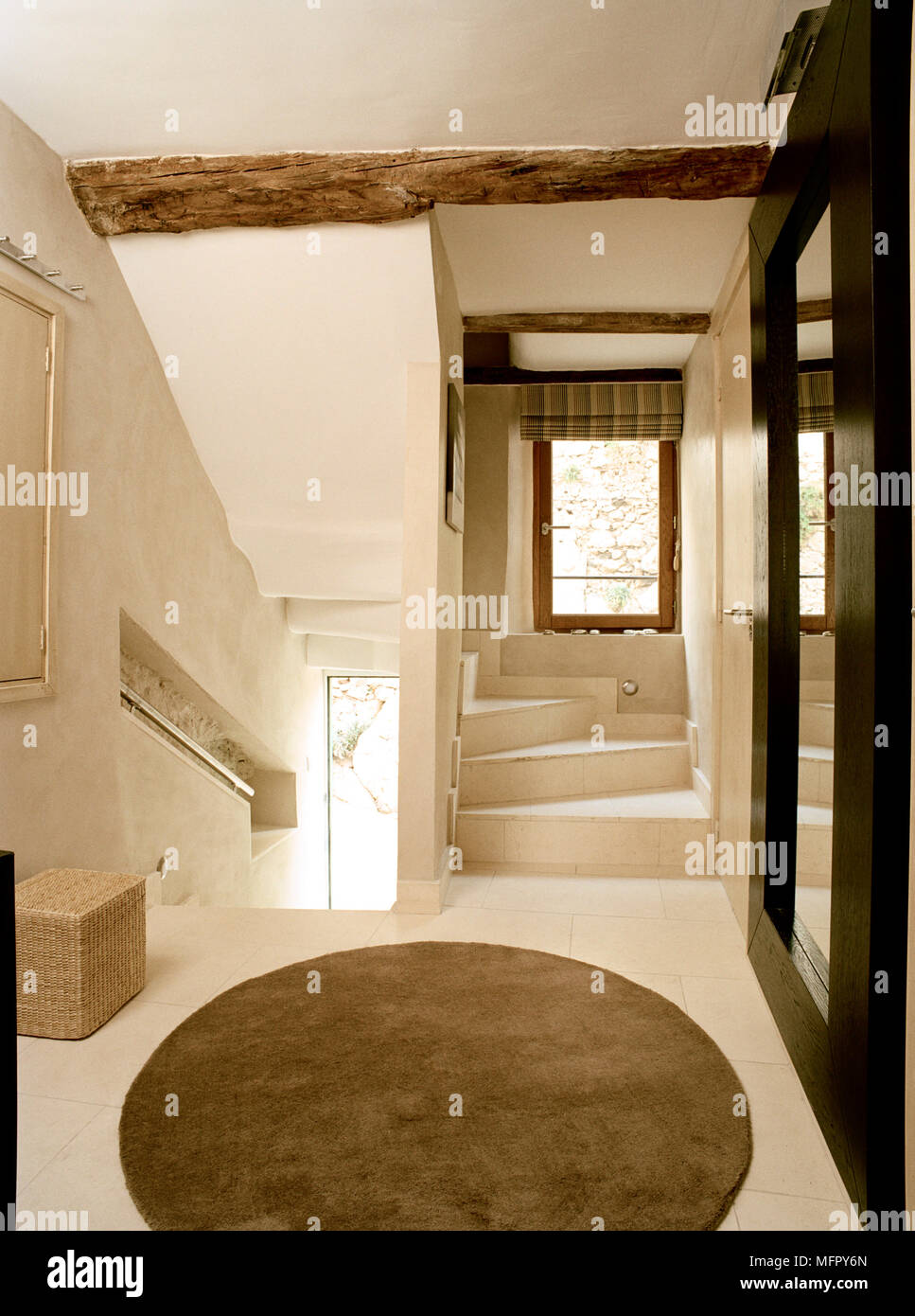 Hallway with beamed ceiling in country style hallway Stock Photo - Alamy