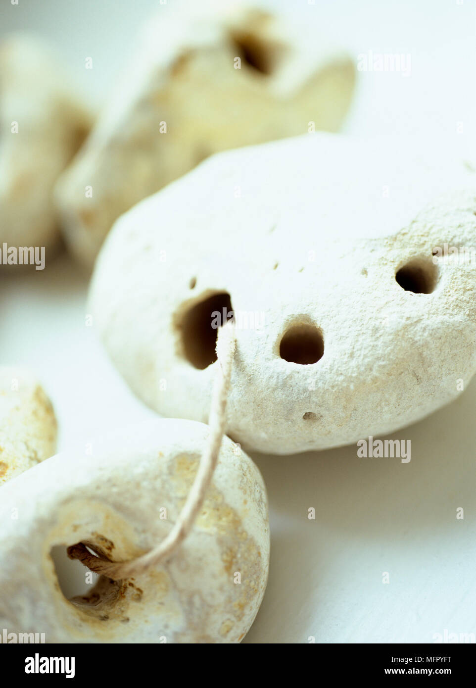 String holes hi-res stock photography and images - Alamy