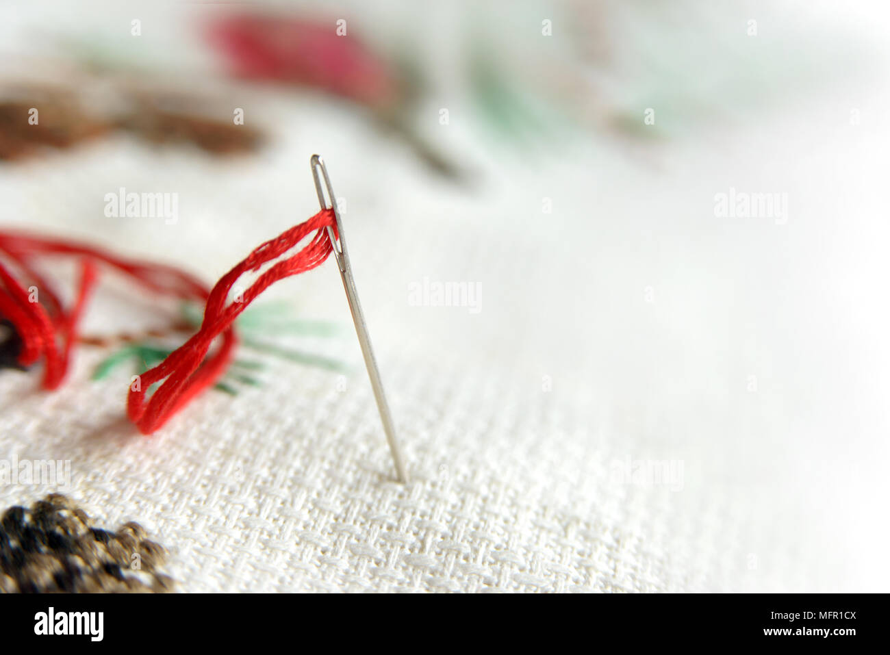 Cross stitch needle hi-res stock photography and images - Alamy