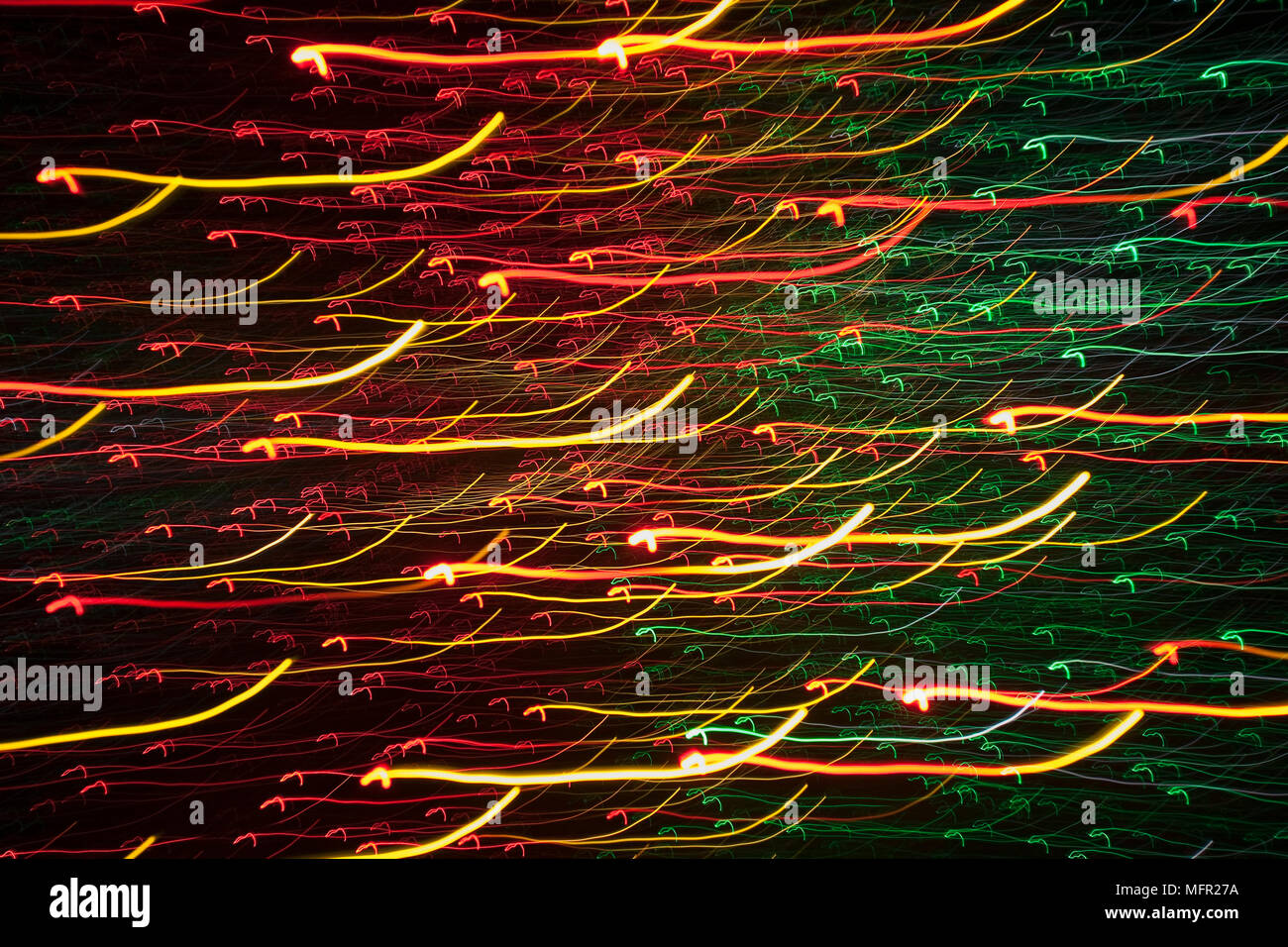 Colourful light tracks in sky Stock Photo - Alamy