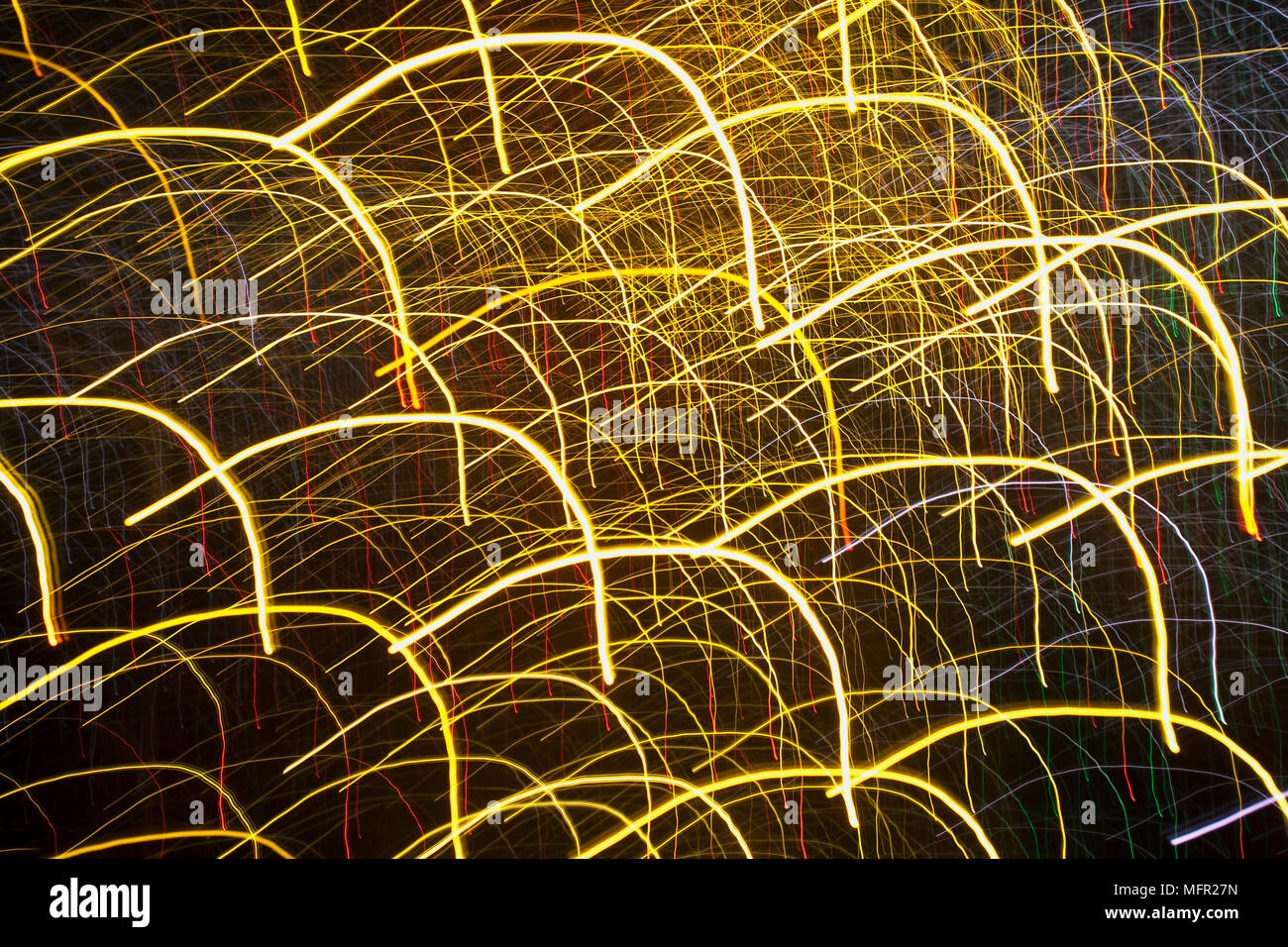 Colourful light tracks in sky Stock Photo - Alamy